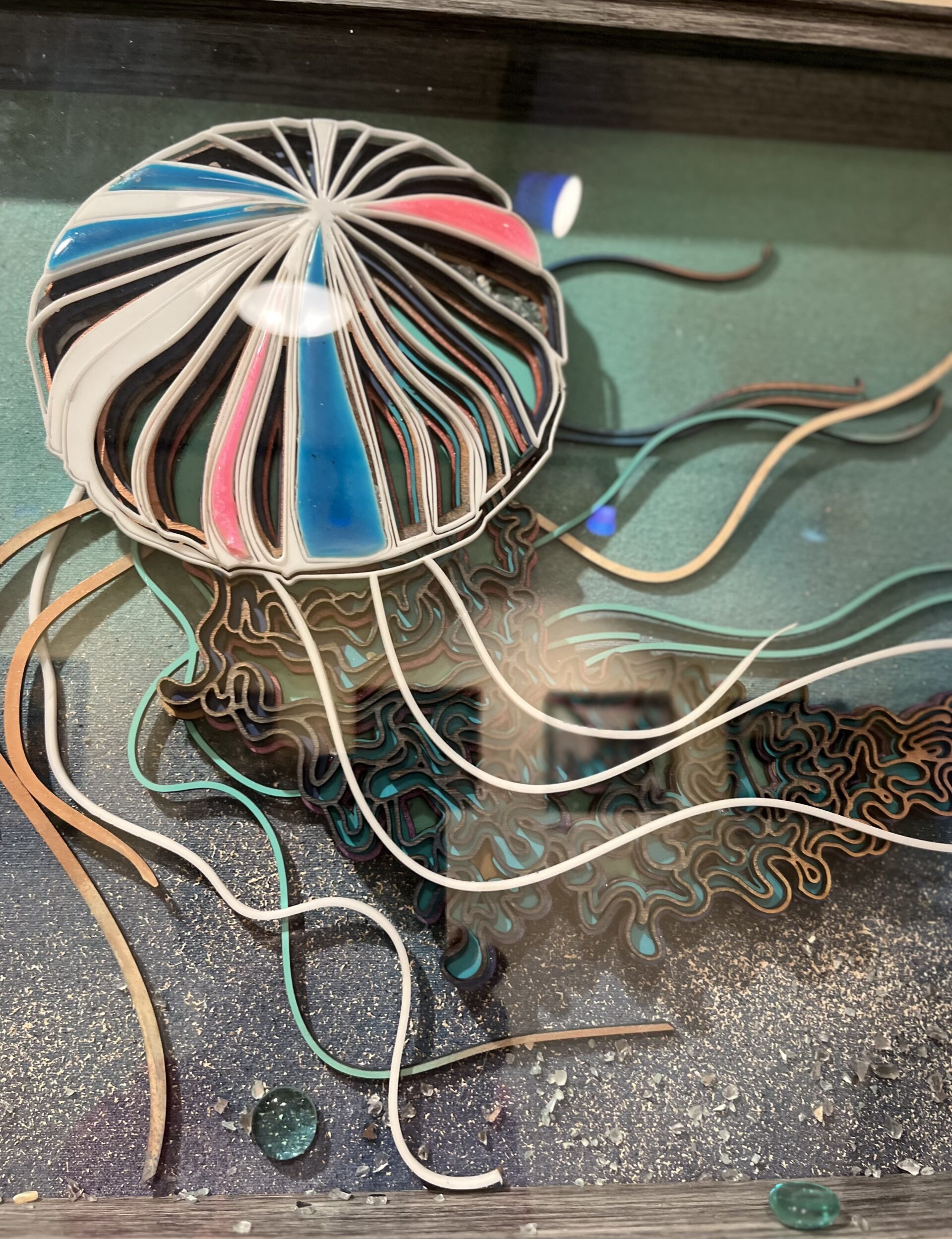 Layers of sustainability: Local artist’s mixed-media work finds a home ...